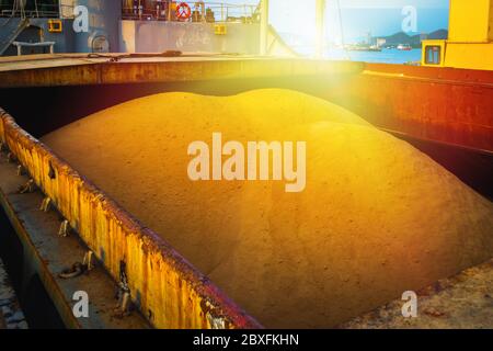 Raw sugar bulk inside large vessel after completed load ready for draft ...