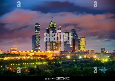City skyline illuminated at night, Moscow, Russia Stock Photo - Alamy