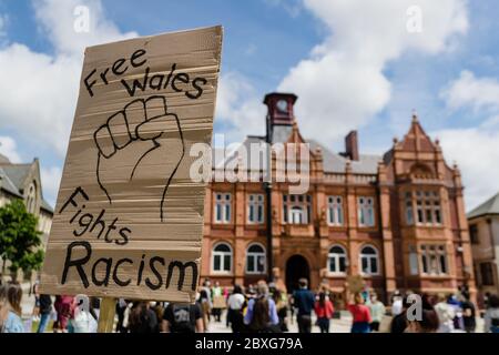 MERTHYR TYDFIL, UK. 07th June, 2020. Protesters talk in front of the ...