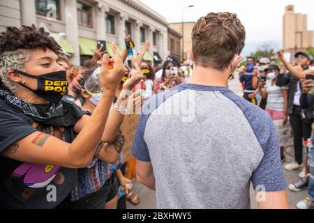 Minneapolis Mayor Jacob Frey walks through Riverside Plaza on Friday ...
