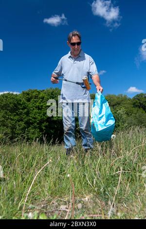 Dump garbage in the field, environmental pollution Stock Photo - Alamy