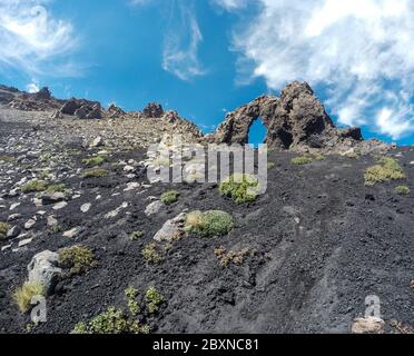 Etna volcano detail - Arco di Tufo in Valle del Bove, rock formation ...