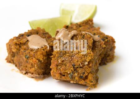 Oven Pumpkin kibbeh isolated on white background Stock Photo - Alamy