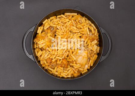 A spicy Libyan chicken pasta dish known as imbakbaka Stock Photo - Alamy