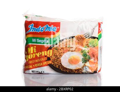 Instant Fried Noodle Indomie Goreng with Sunny Side Egg Stock Photo - Alamy