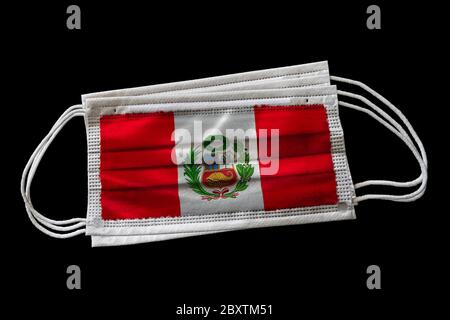 Face mask with Peru flag printed, on white background, isolated. Covid ...