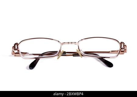 A selective focus shot of optical glasses on a mirroring surface Stock ...