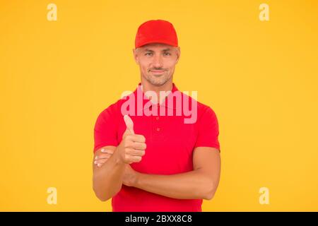 Super cool. Happy man give thumbs up yellow background. Handsome guy ...