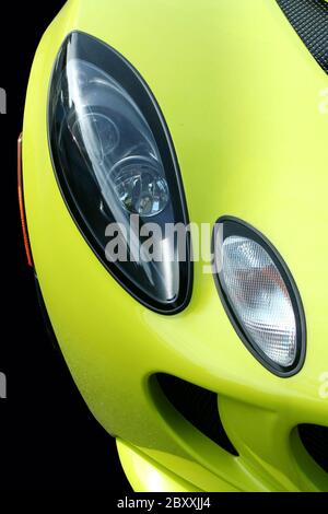 Side view new car headlights view Stock Photo - Alamy