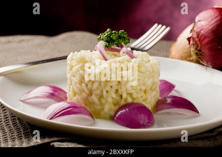 Risotto with red onions Stock Photo - Alamy