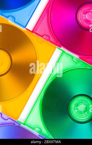 Computer disks in multiciolored boxes Stock Photo - Alamy
