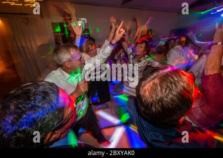 Exuberant disco fever of the wedding party. Wedding in South ...