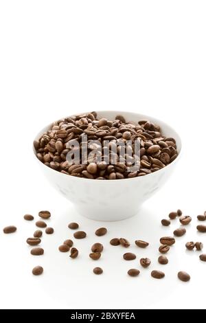 Roasted coffee beans inside white coffee cup. Top view Stock Photo - Alamy