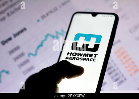 In this photo illustration, a Howmet Aerospace logo is seen displayed ...
