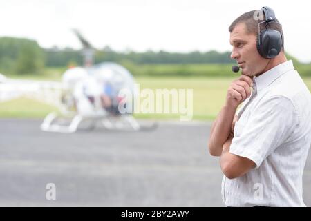 a man on helicopter deck offshore Stock Photo - Alamy
