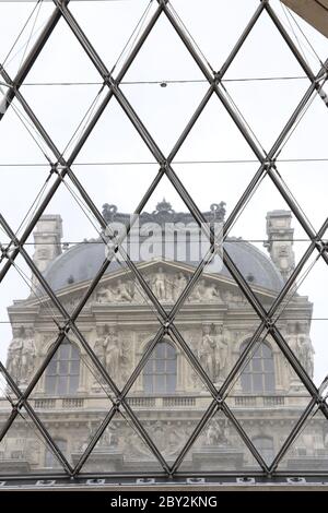 View of the Louvre from the underground lobby of the Louvre pyramid of ...