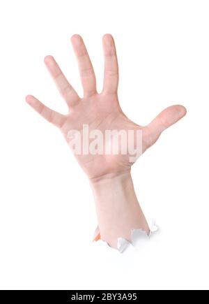 Hand punching through white paper and ok sign Stock Photo - Alamy