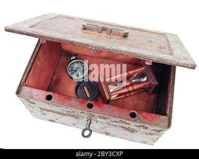 Compass in open old chest over white background Stock Photo - Alamy