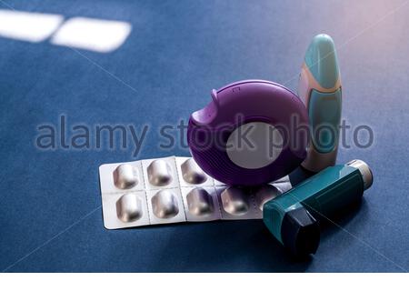 Blue reliever inhaler salbutamol inhaler asthma on a white background ...