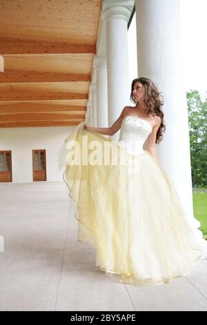 Photo of long-haired girl dancing modern dances on red-green background ...