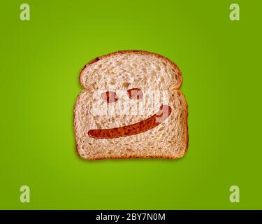 toasted bread slice with smile sign on green made by honey background ...