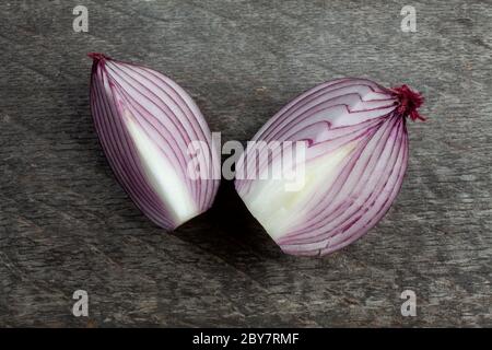 Different raw onion on wooden background Stock Photo - Alamy