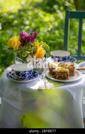 Afternoon tea outside Stock Photo - Alamy