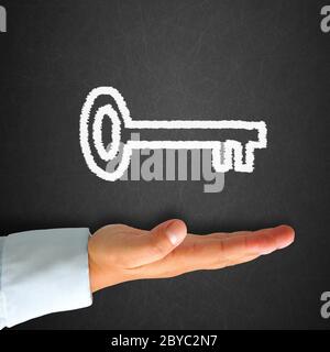 Key and locker on blackboard Stock Photo - Alamy