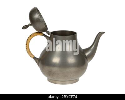 Very old tin tea pot full of scratches Stock Photo - Alamy