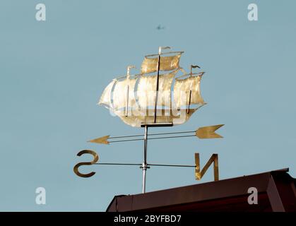 Wind indicator ship on the roof Stock Photo - Alamy