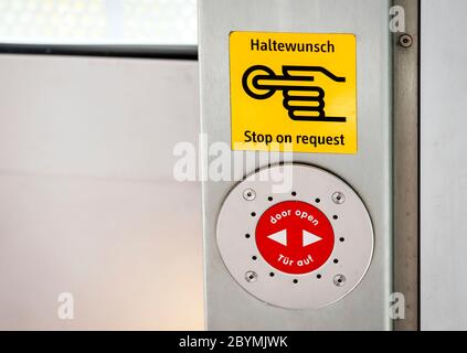 Stop request button in a bus Stock Photo - Alamy