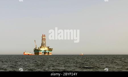 The anchors of the semi-sub oil rig Ocean Nomad are lifted by the ...