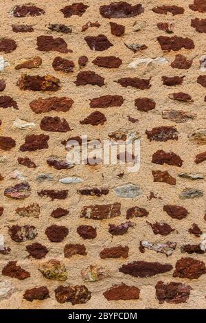 Stone wall with rough texture in bright light Stock Photo - Alamy
