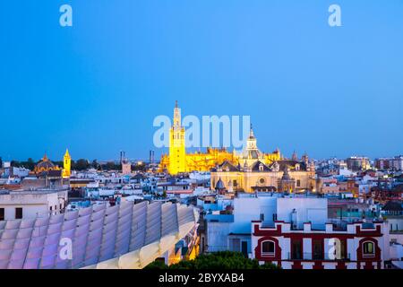 Seville Cathedral and cityscape downtown at dusk Sevilla, Spain Stock ...