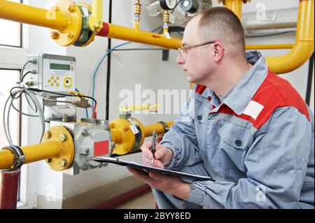 heating engineer in boiler room Stock Photo - Alamy