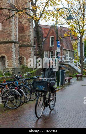 Vrouwengracht canal, Delft, South Holland, Netherlands: bicycles used ...