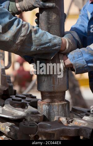 An oil company rig drilling for oil, Sahara desert Stock Photo - Alamy