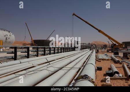 Pipe runs begin to take shape In the construction of a new oil facility ...