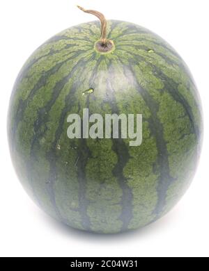 Single whole watermelon with a cut slice isolated on a white background ...