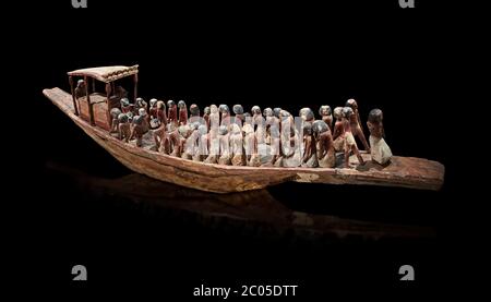 Ancient Egyptian model of a funerary boat with oarsman and a sarcopagus ...