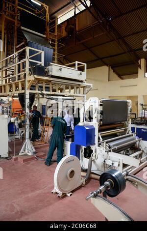RWANDA, Kigali, plastic recycling at company Ecoplastics, machine Kabra ...