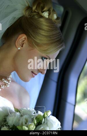 A beautiful bride getting ready for her wedding in her room Stock Photo ...