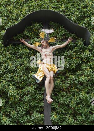 statue of Jesus Christ crucified covered by snow Stock Photo - Alamy