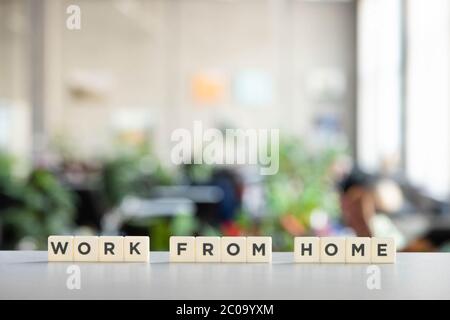 white cubes with work at home lettering on white desk in office Stock ...