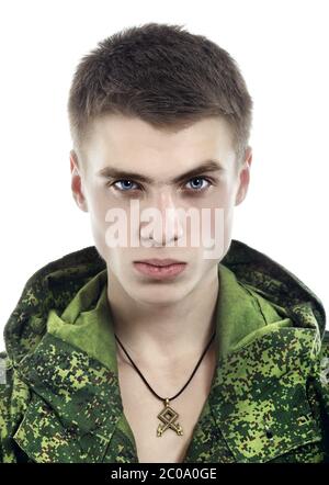 Portrait of military man standing with arms crossed during obstacle ...