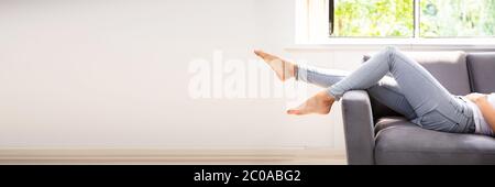 Lazy Woman Sleeping On Couch Or Sofa Stock Photo - Alamy