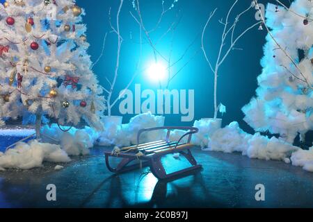 Sledge on an evening skating rink, scenery Stock Photo - Alamy