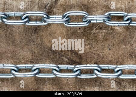 Two chains crossing old book cover Stock Photo - Alamy