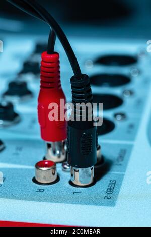 Rear panel of music system amplifier with wires Stock Photo - Alamy