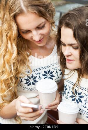 Social Media Fun. Two friends dancing and enjoying a moment together in ...